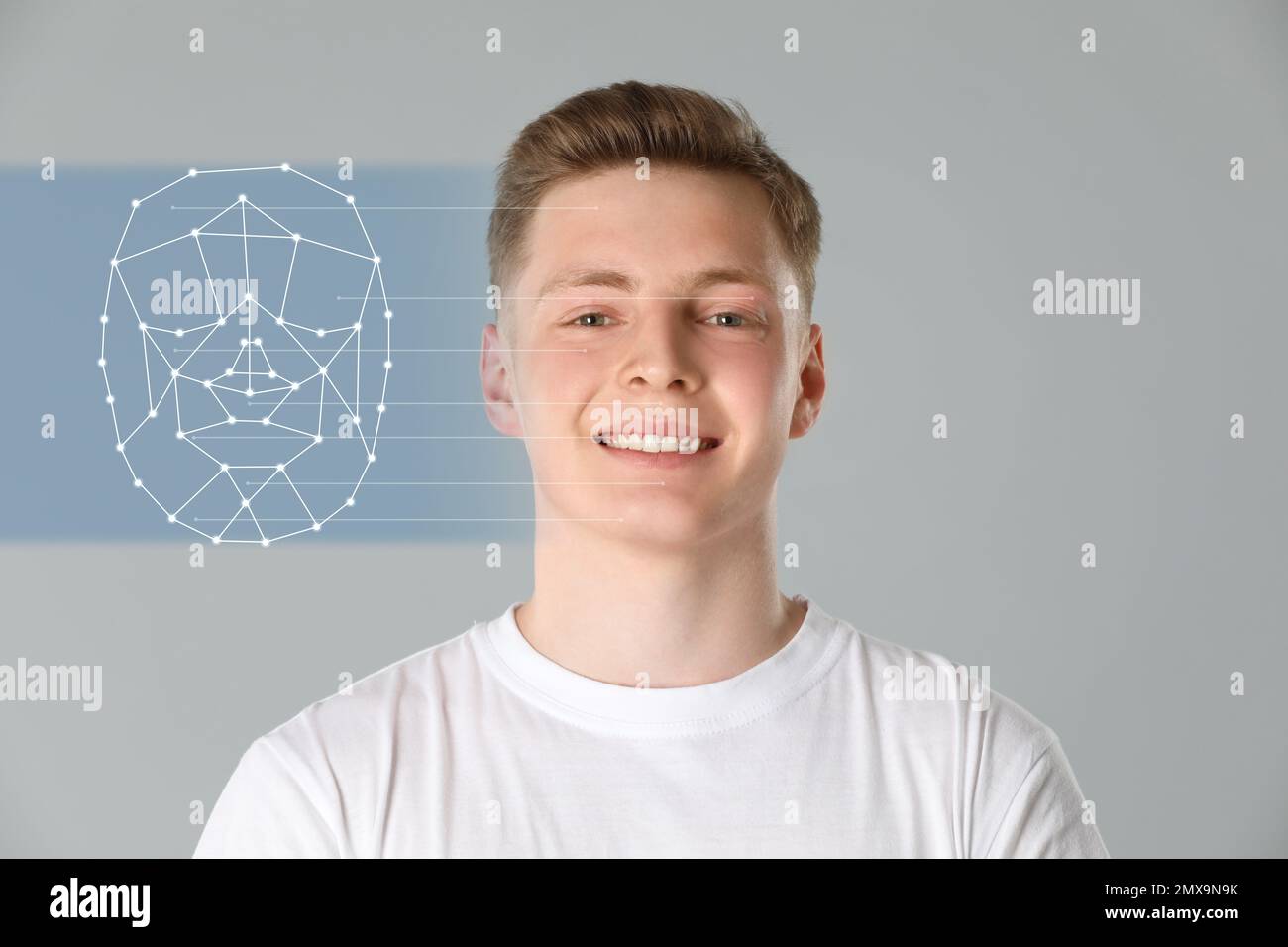 Facial recognition system. Teenage boy and biometric identification ...