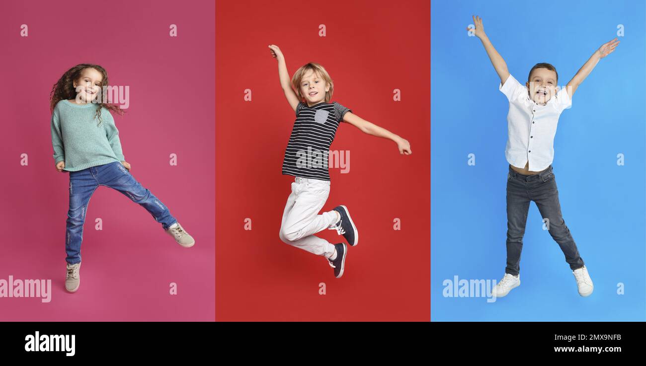 Collage of emotional children jumping on different color backgrounds ...