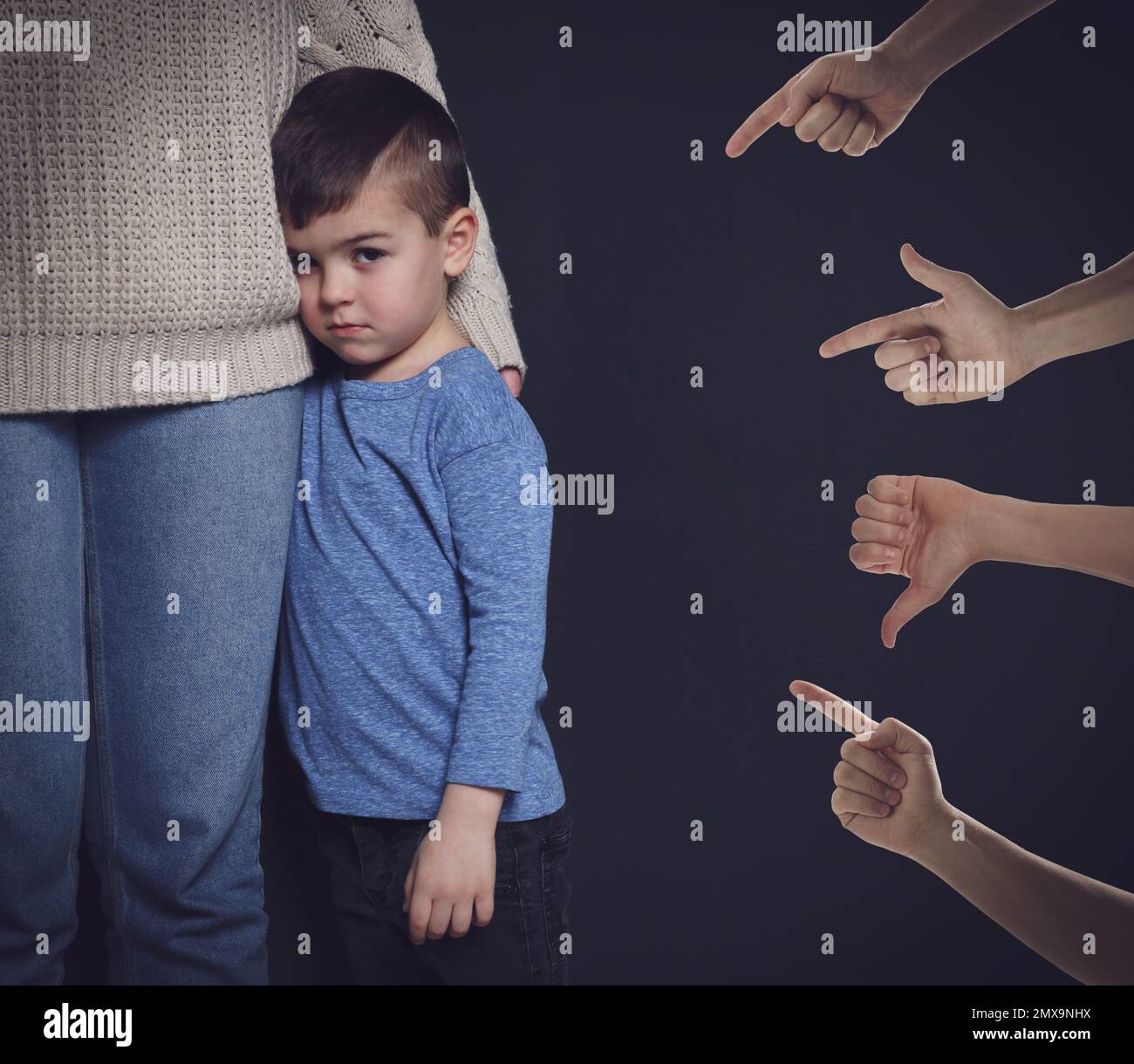 People bullying little boy on black background Stock Photo - Alamy