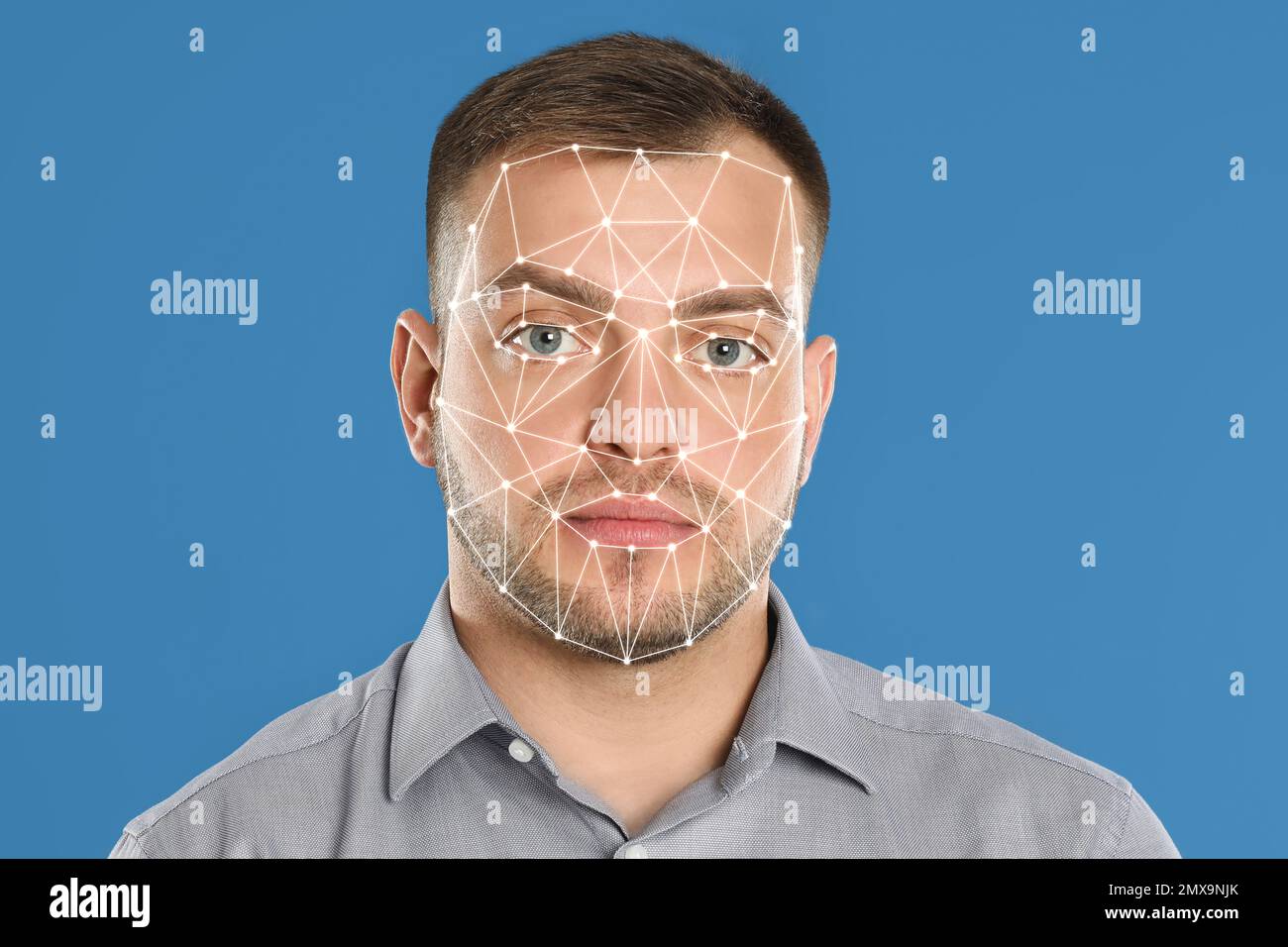 Facial recognition system. Young man with biometric identification ...