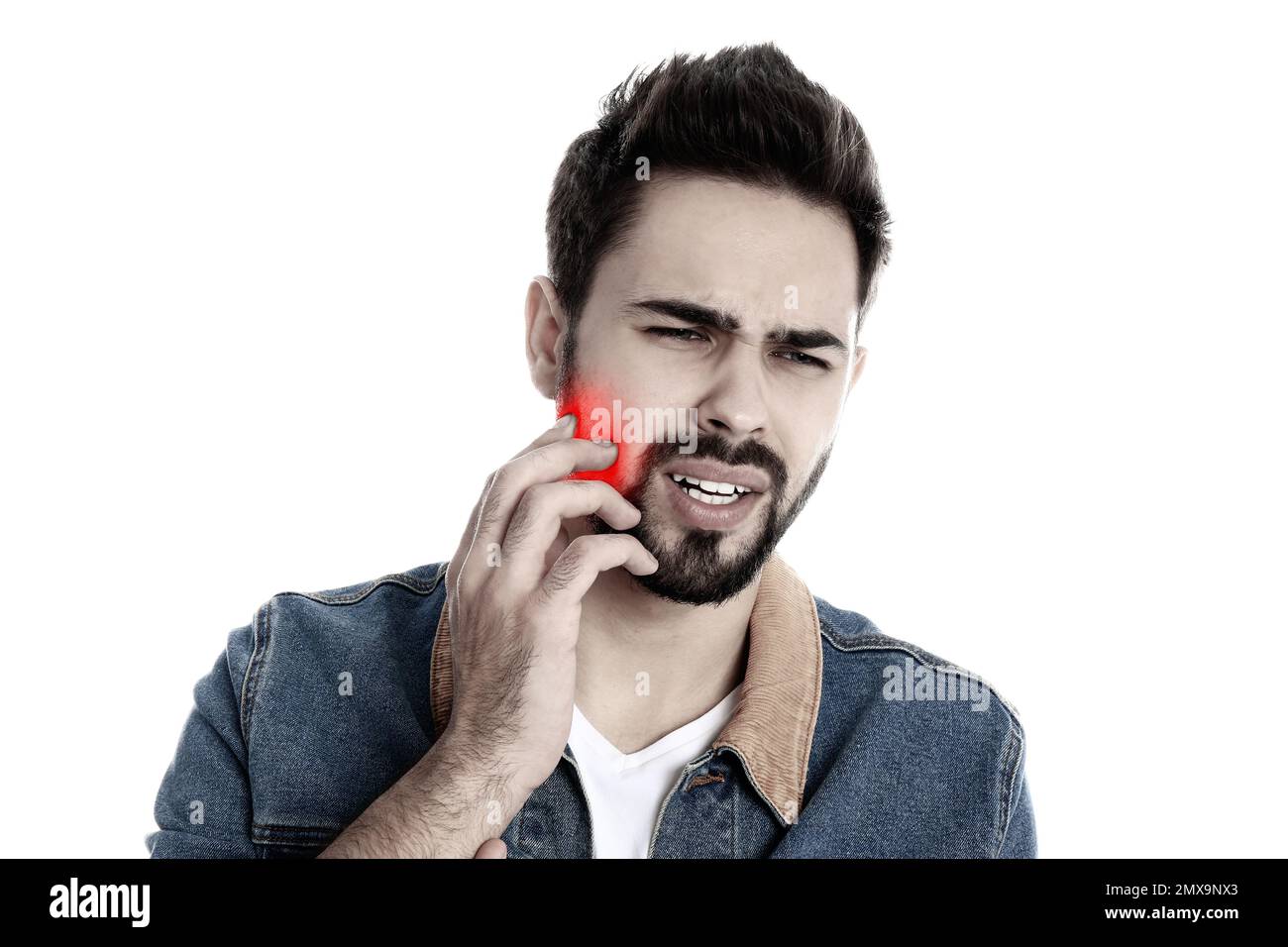 Young man suffering from toothache on white background Stock Photo - Alamy