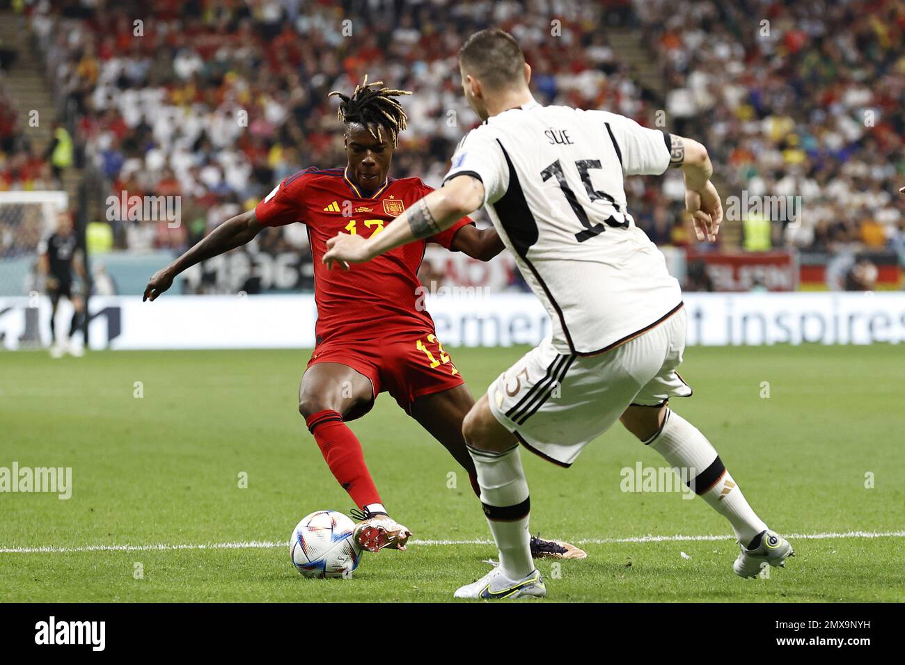AL KHOR - (LR) Nico Williams of Spain, Niklas Sule of Germany during ...