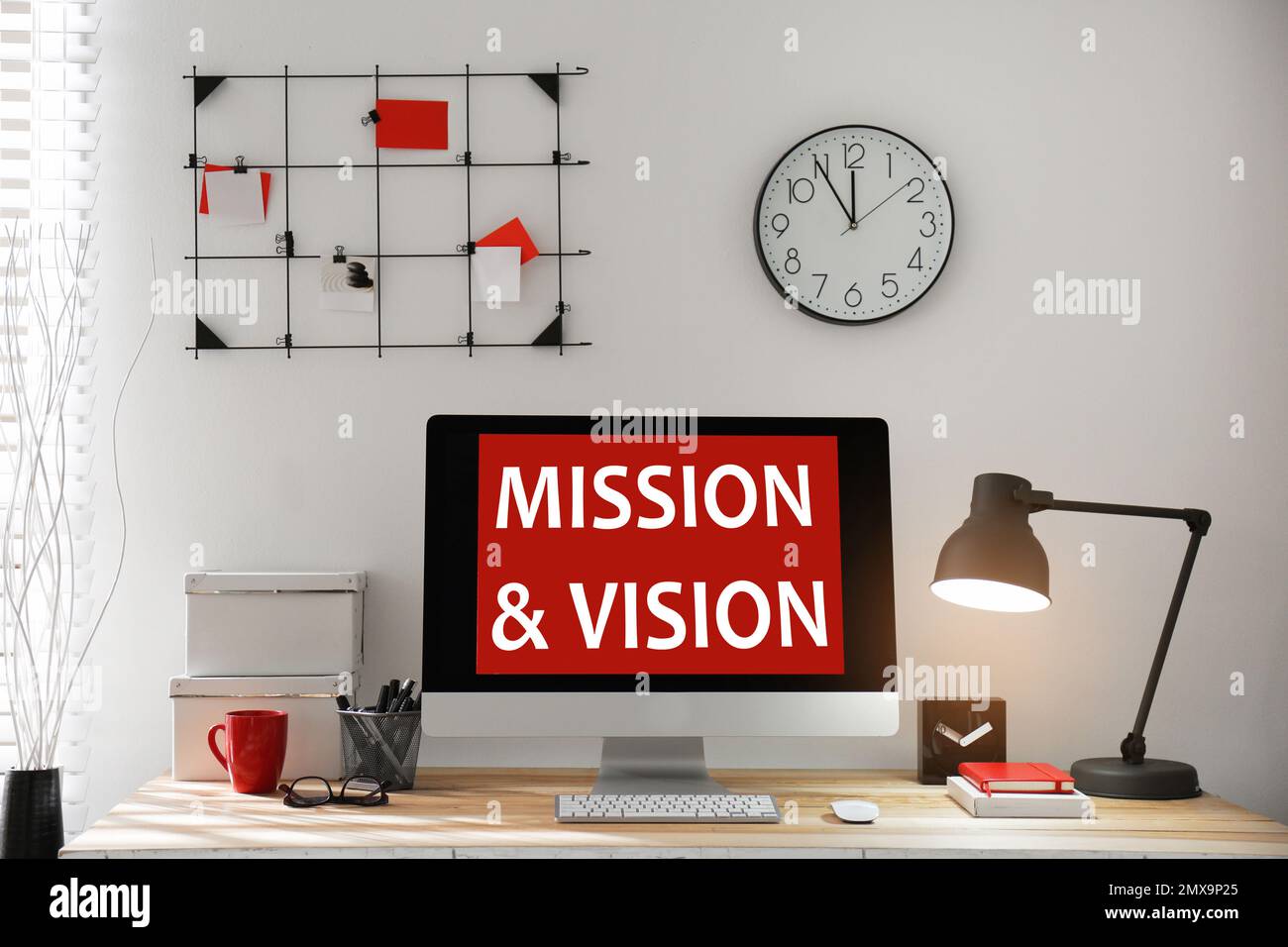 Modern computer with phrase MISSION AND VISION indoors Stock Photo - Alamy