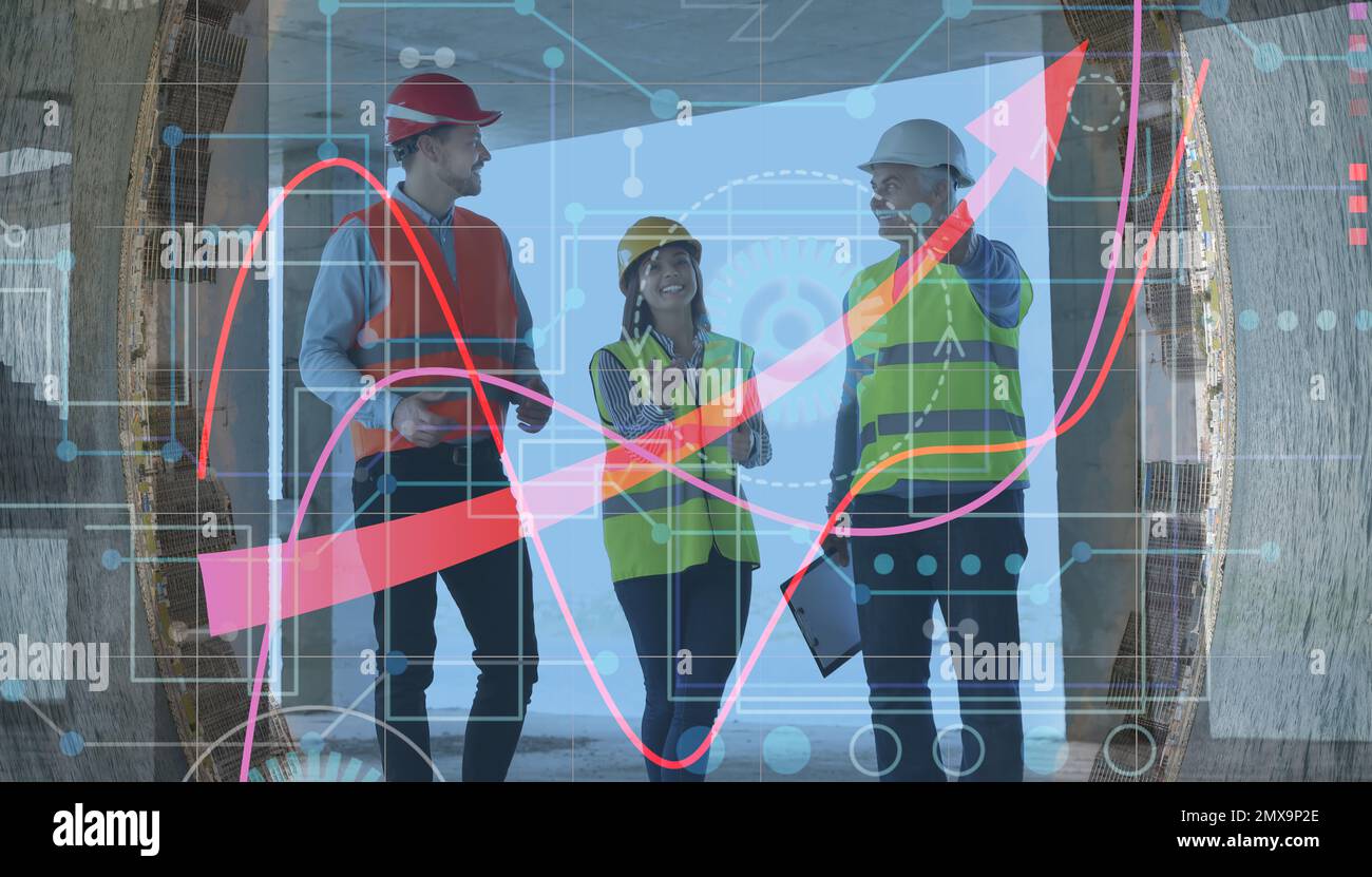 Group of engineers at construction site and schemes Stock Photo - Alamy