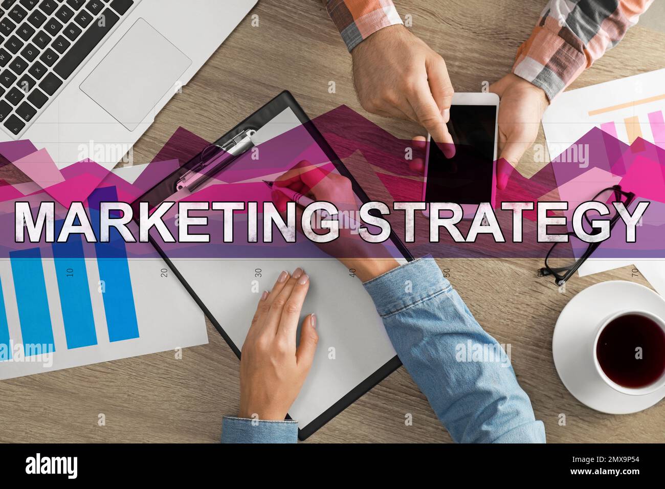 Digital marketing strategy. People working at table in office, top view ...