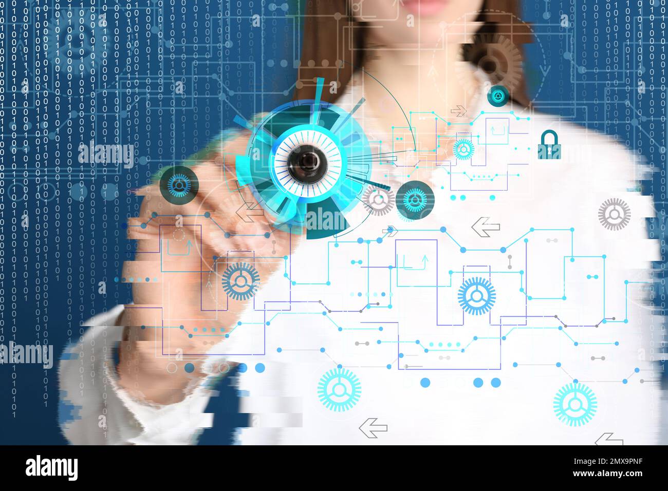 Young woman pointing at digital schemes on blue background. Modern technology Stock Photo - Alamy