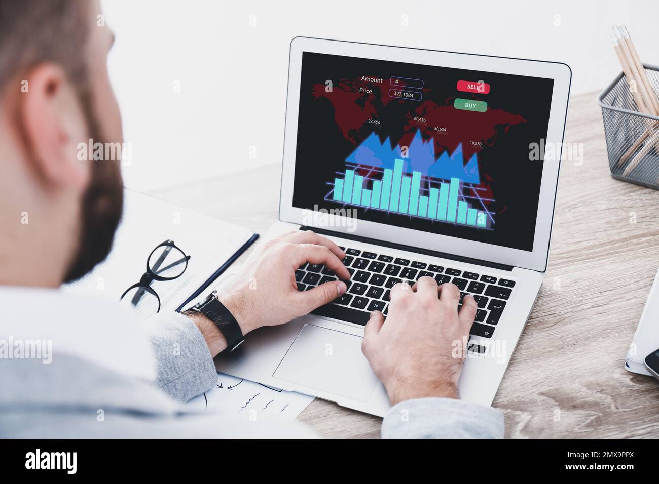 Male broker using computer home hi-res stock photography and images - Alamy