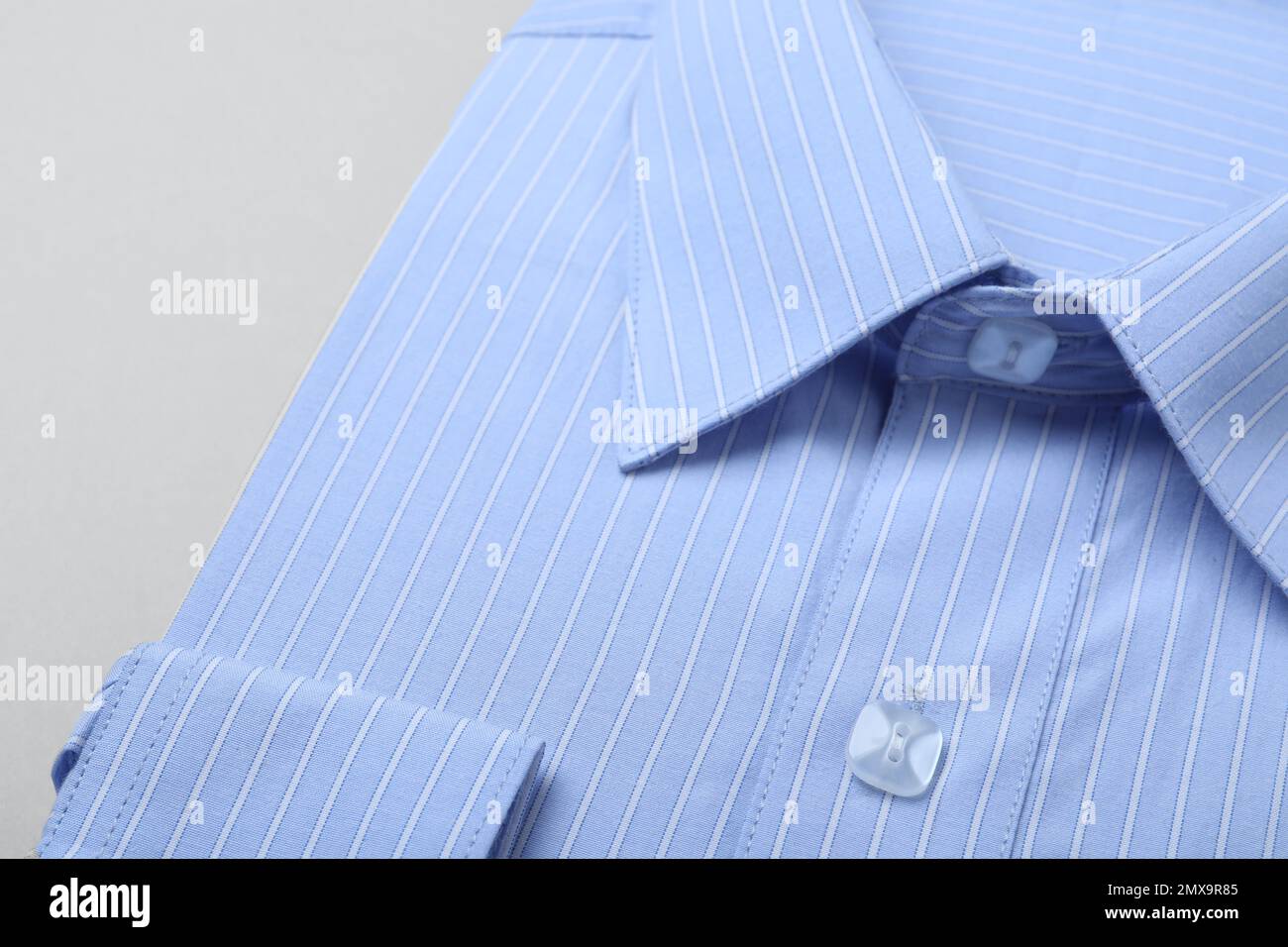 Blue shirt on white background hi-res stock photography and images - Alamy