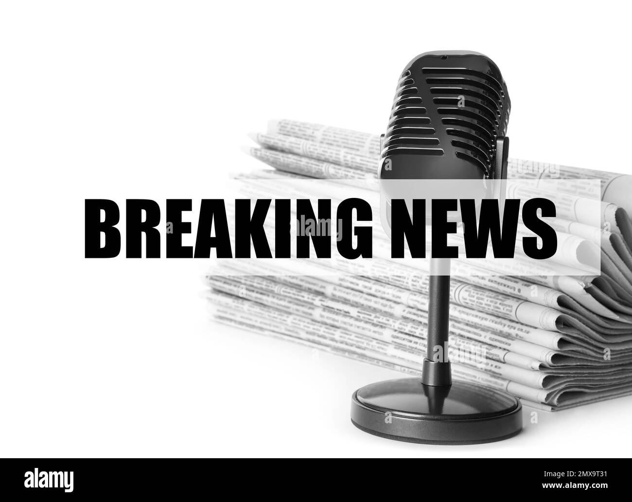 Phrase Breaking News and vintage microphone on white background ...