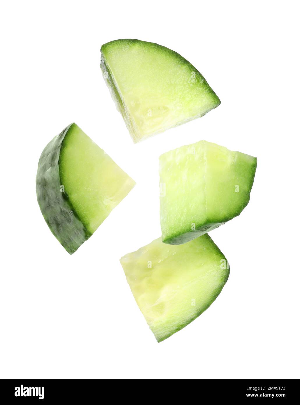 Set of flying fresh cucumber slices on white background Stock Photo - Alamy