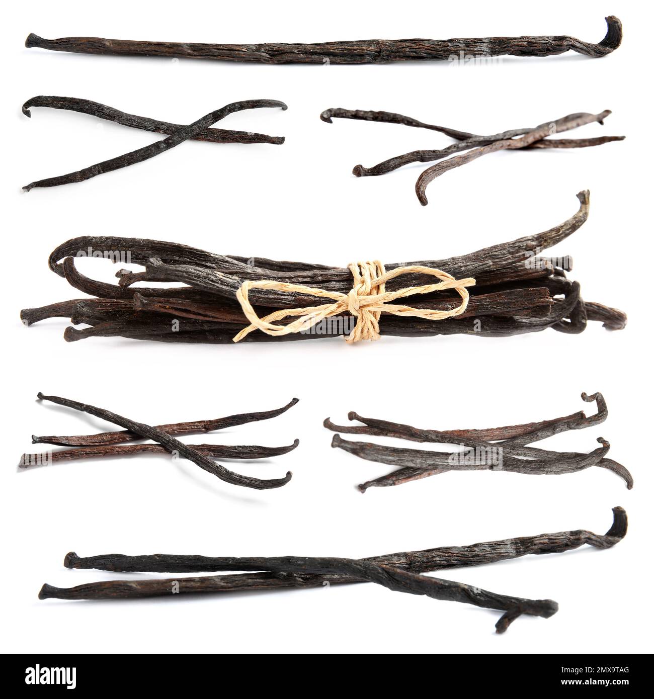 Set with dried vanilla pods on white background Stock Photo - Alamy