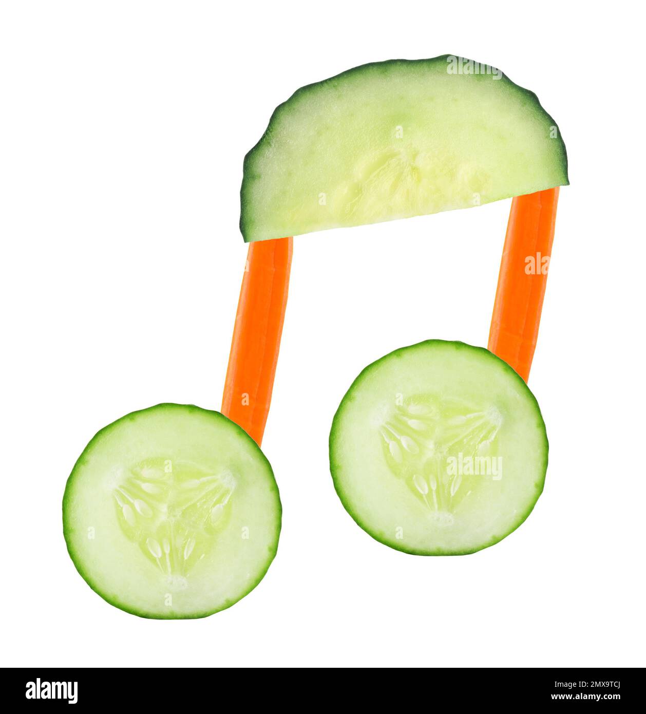 Musical note made of vegetables on white background Stock Photo - Alamy