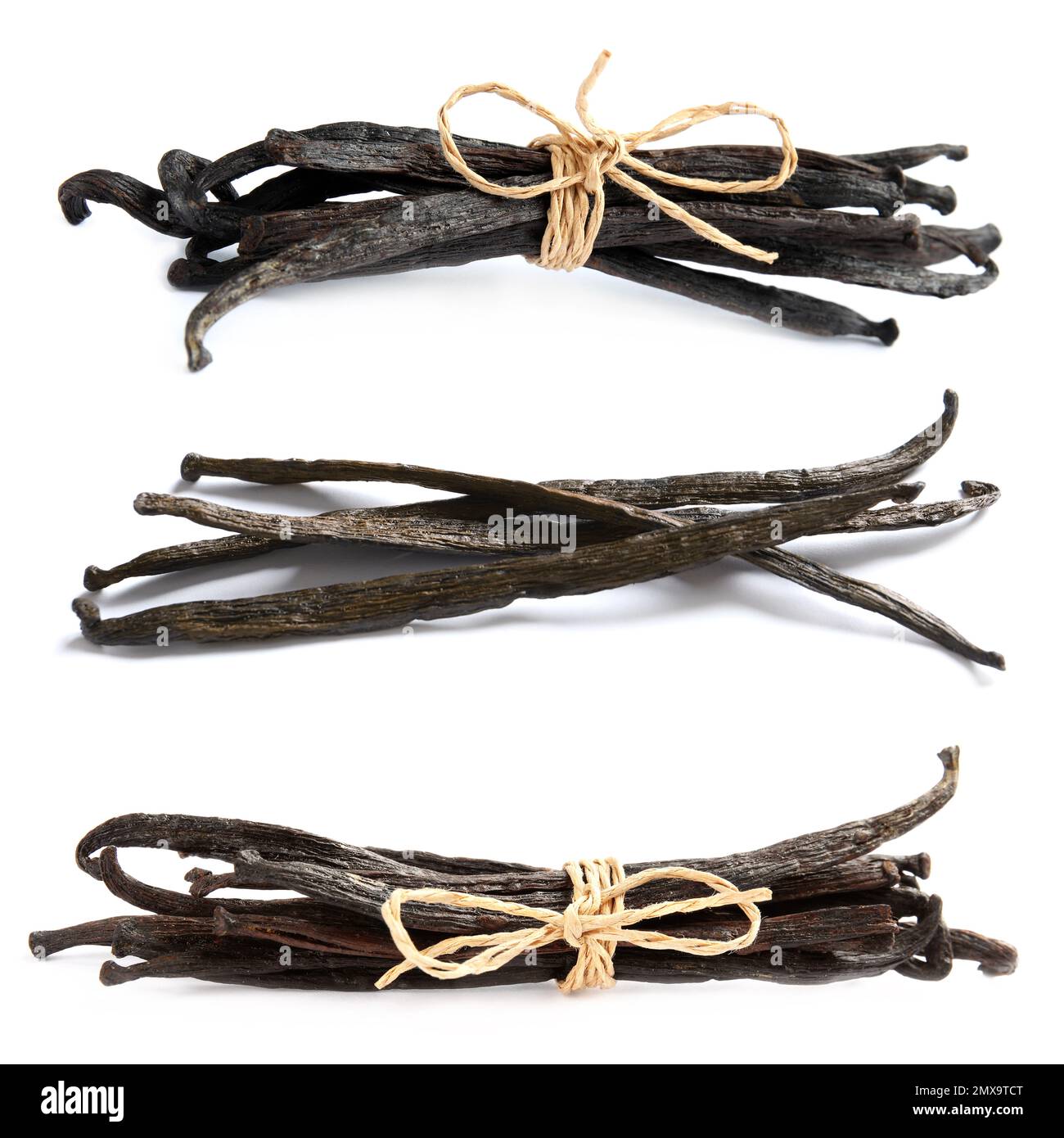Set with dried vanilla pods on white background Stock Photo - Alamy
