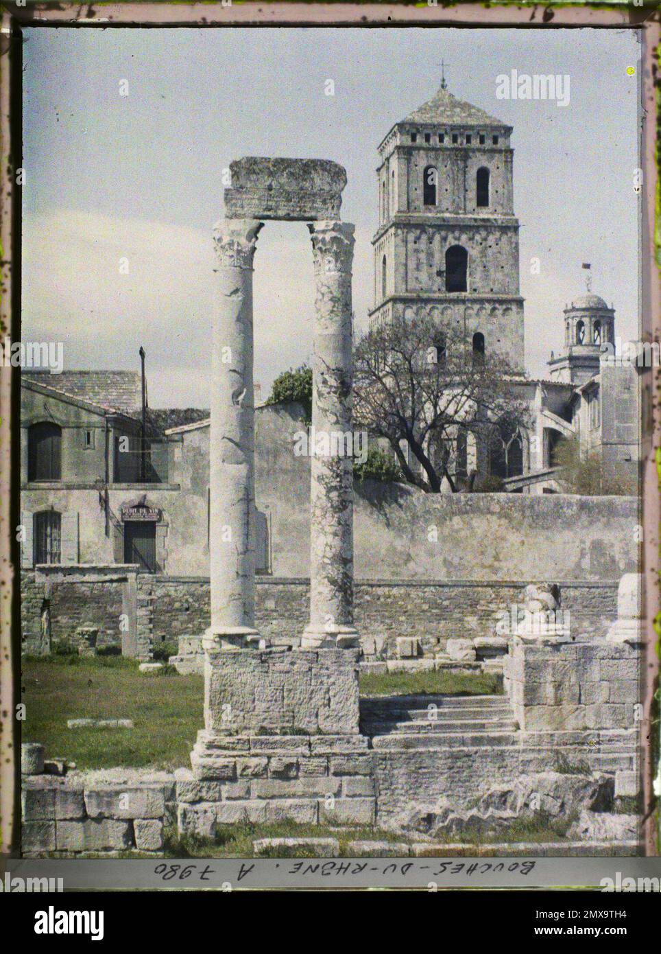 Arles, France The columns of the ancient theater, with the bell tower ...