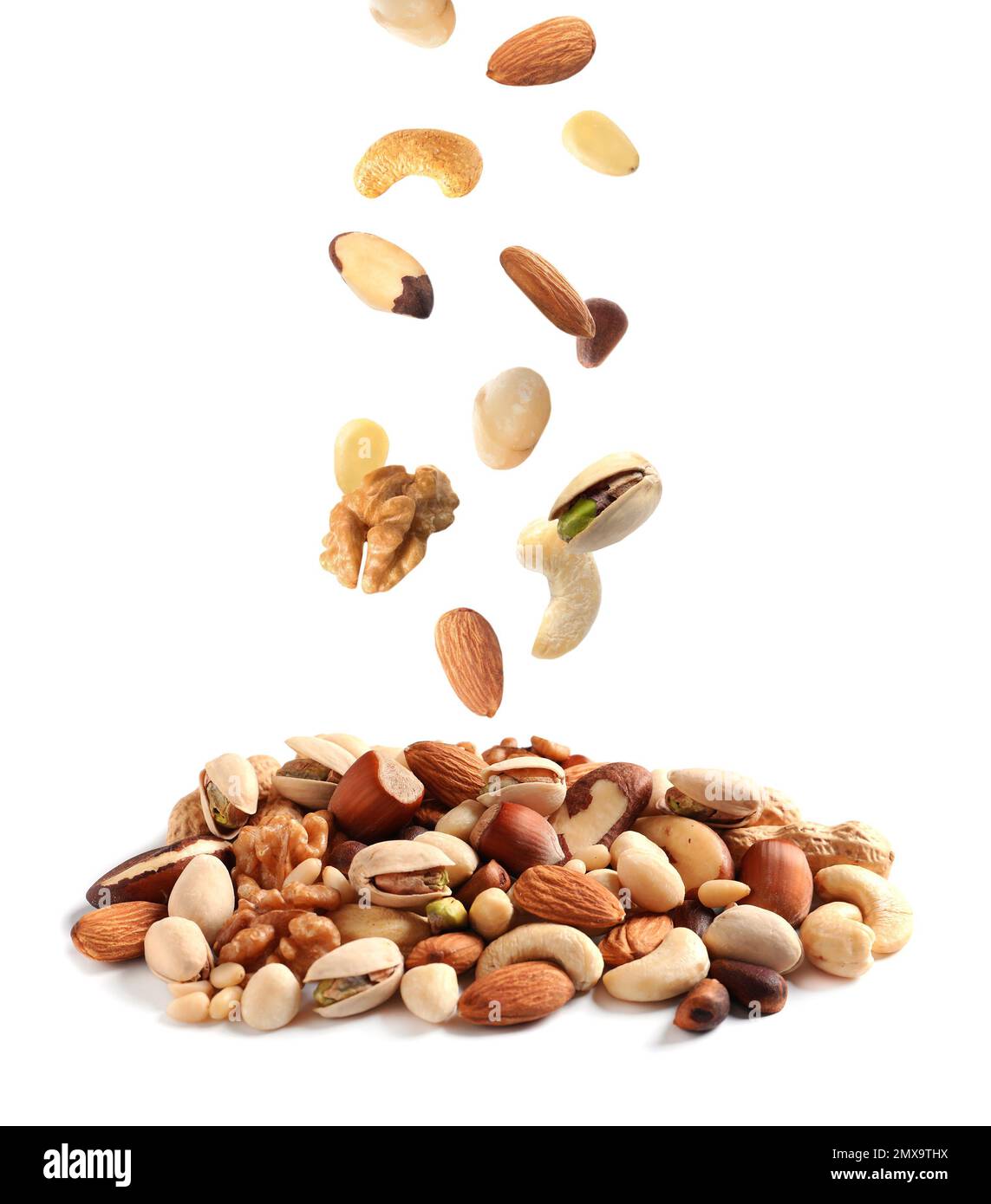 Different nuts falling pile hi-res stock photography and images - Alamy