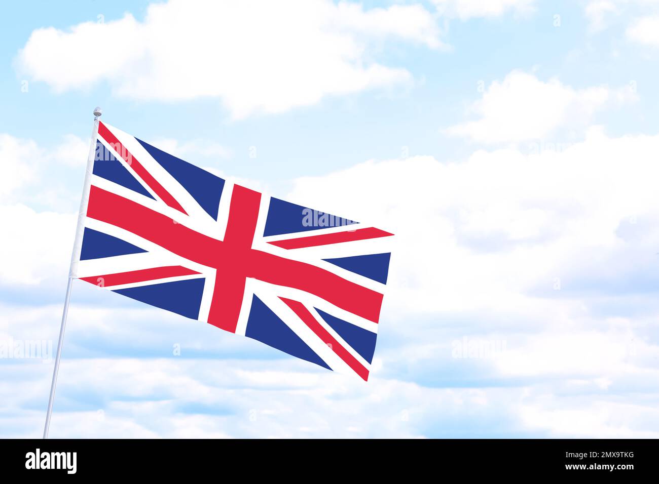 Flag of Great Britain outdoors on cloudy day, space for text. Learning ...