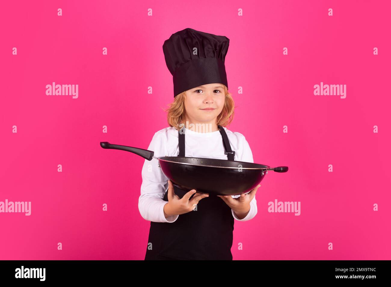 Kid chef cook cookery with pan. Cooking children. Chef kid boy making ...