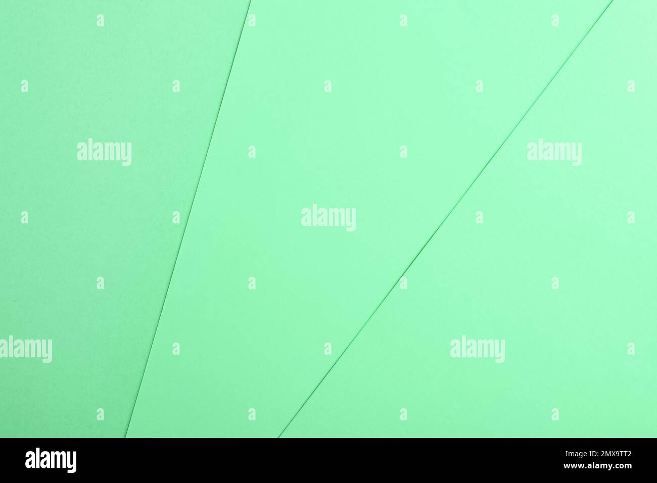 Paper sheets as background. Image toned in mint color Stock Photo - Alamy
