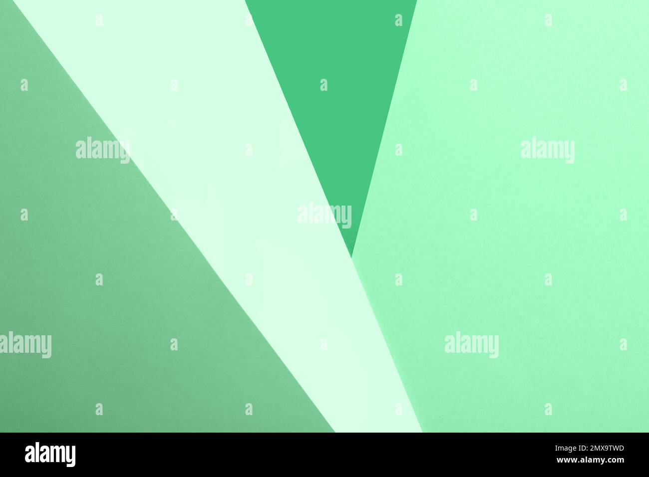 Paper sheets as background. Image toned in mint color Stock Photo - Alamy