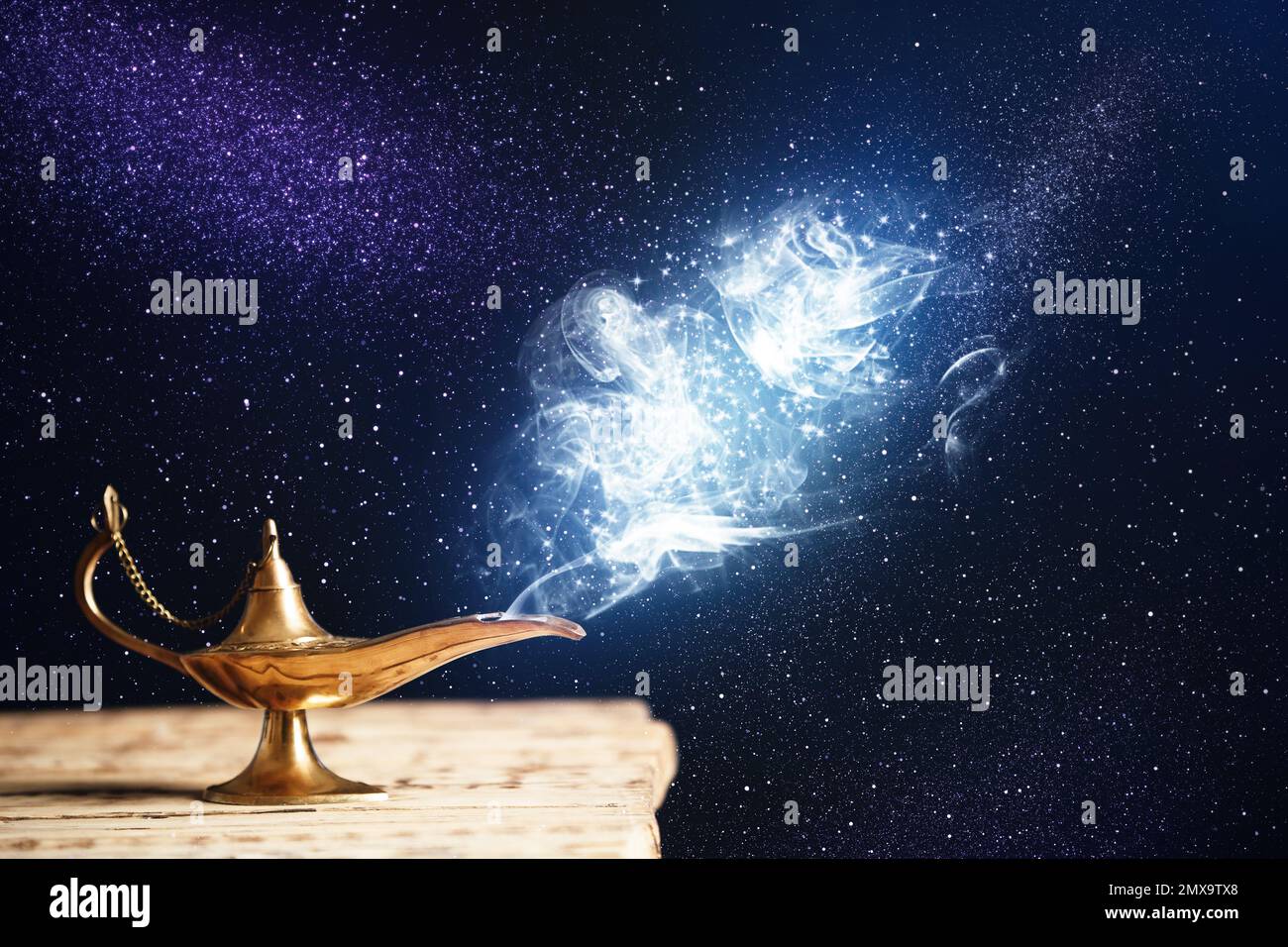 Genie appearing from magic lamp of wishes. Fairy tale Stock Photo - Alamy
