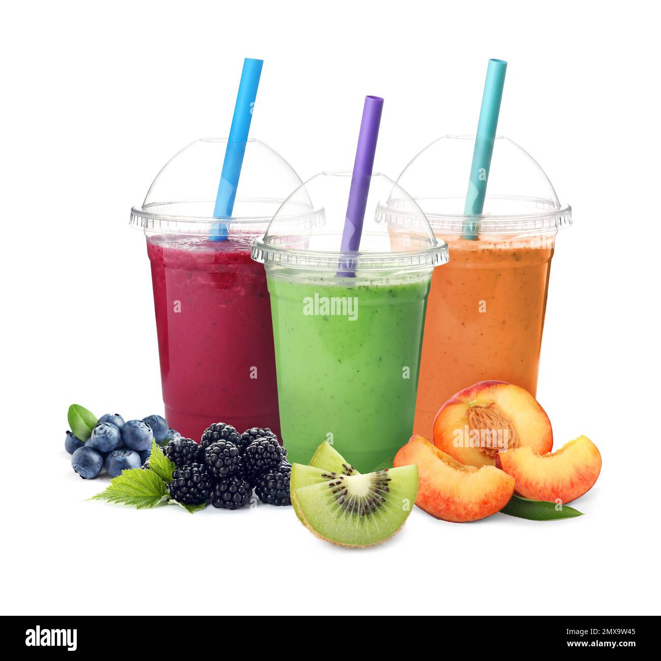 Different delicious smoothies in plastic cups on white background Stock ...