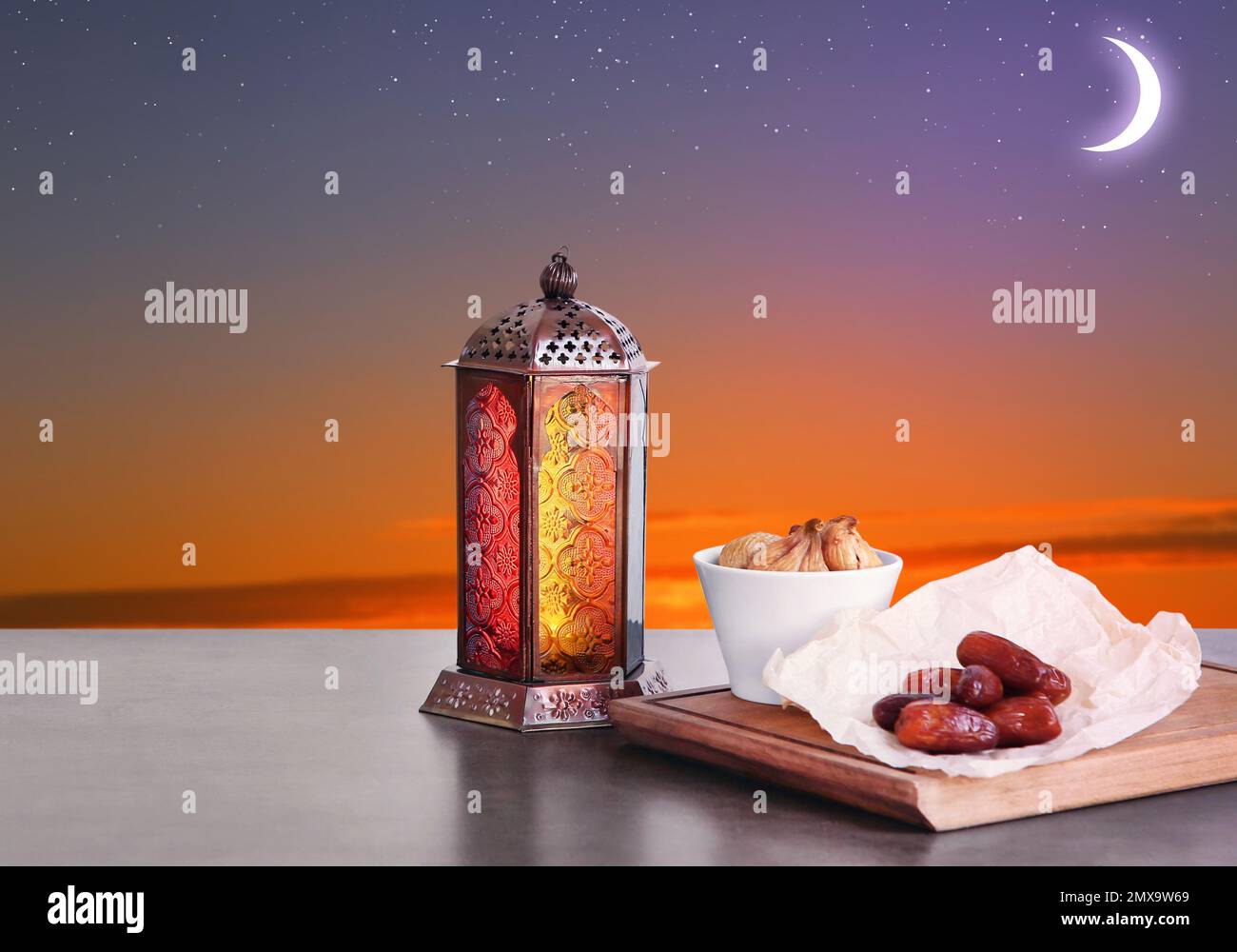 Traditional Ramadan lantern and dry fruits on table. Muslim holiday ...