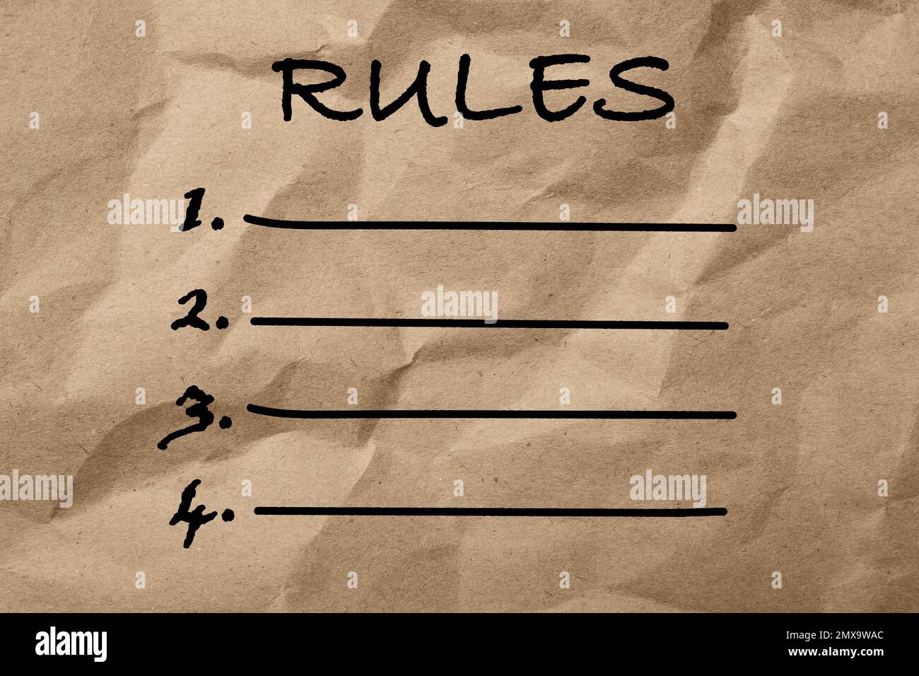 Brown crumpled paper with list of rules as background, top view Stock ...