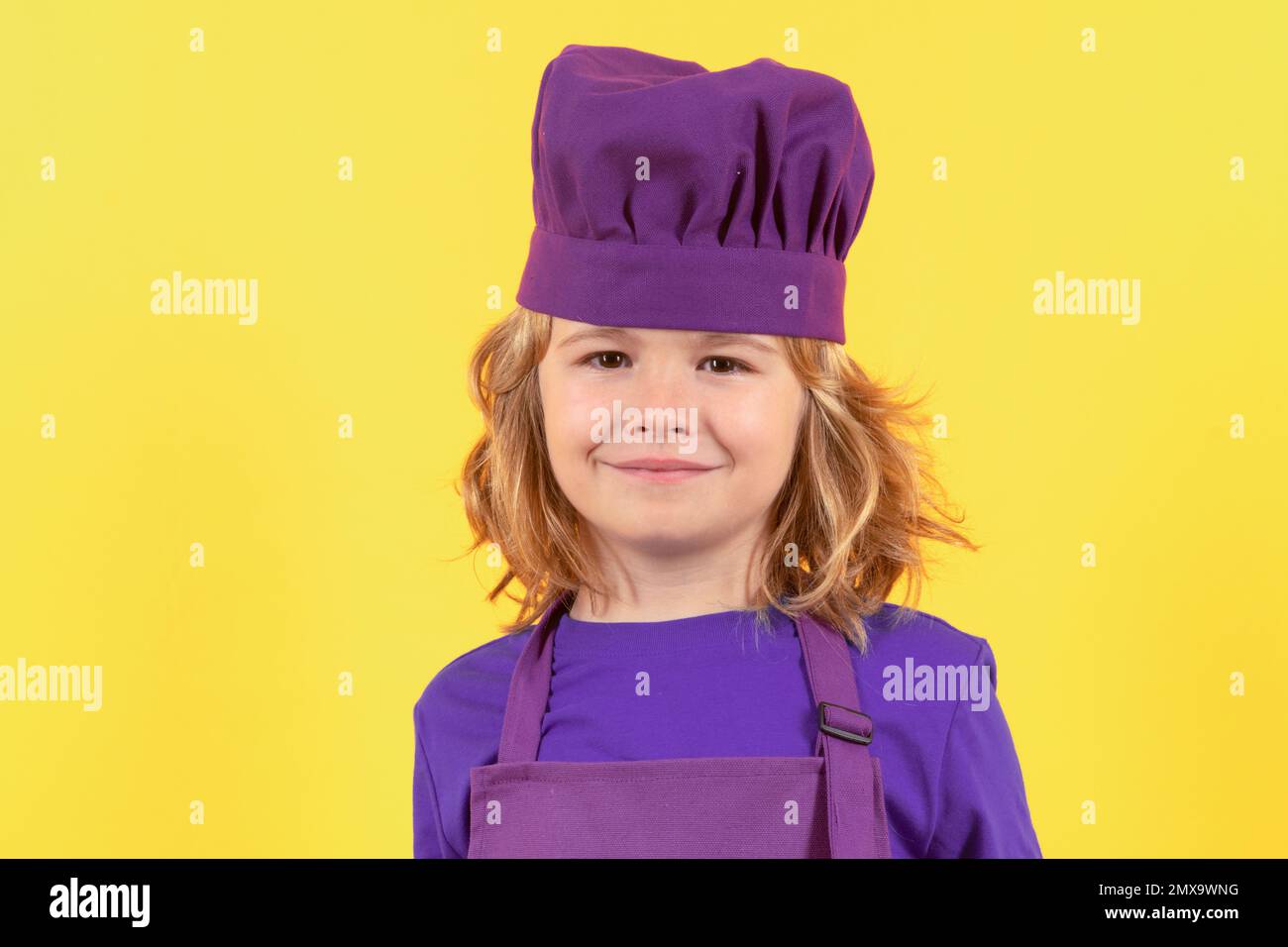Funny kid chef cook studio portrait. Excited chef cook. Child wearing ...