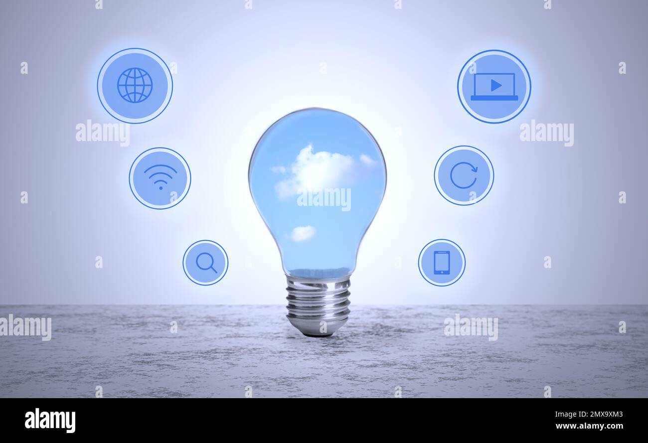 Cloud technology concept. Light bulb with sky and different icons Stock ...