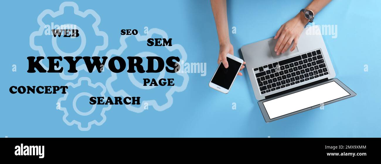 Woman with smartphone using laptop and elements of keywords research on ...