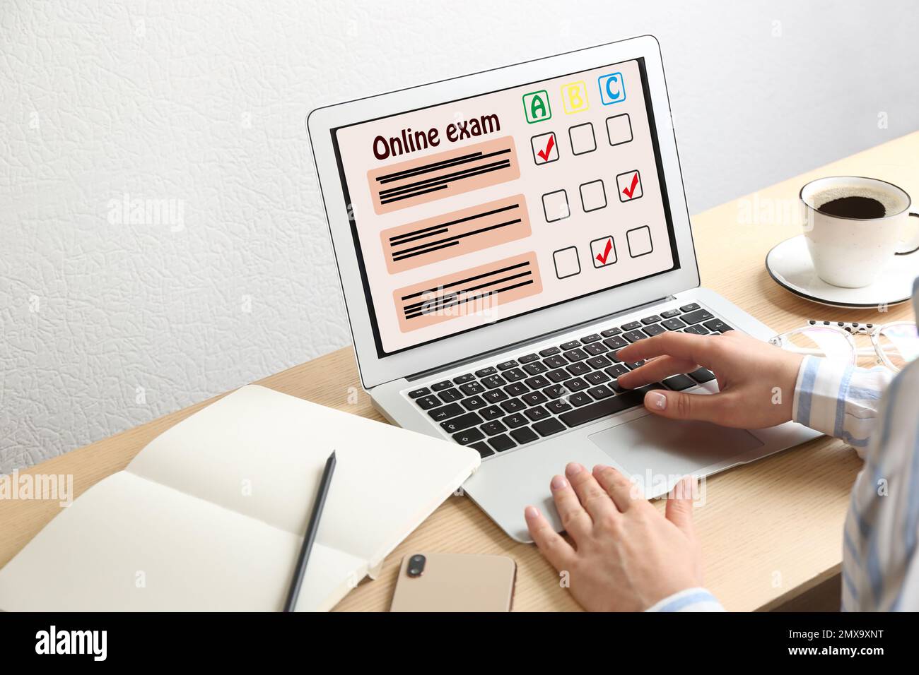 Student passing online exam at home, closeup Stock Photo - Alamy