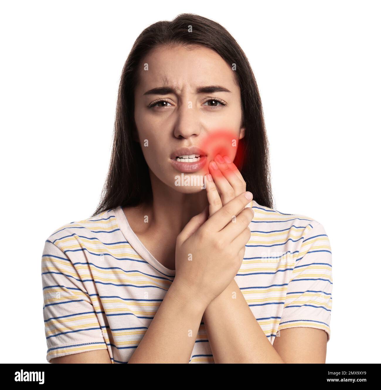 Young woman suffering from toothache on white background Stock Photo ...