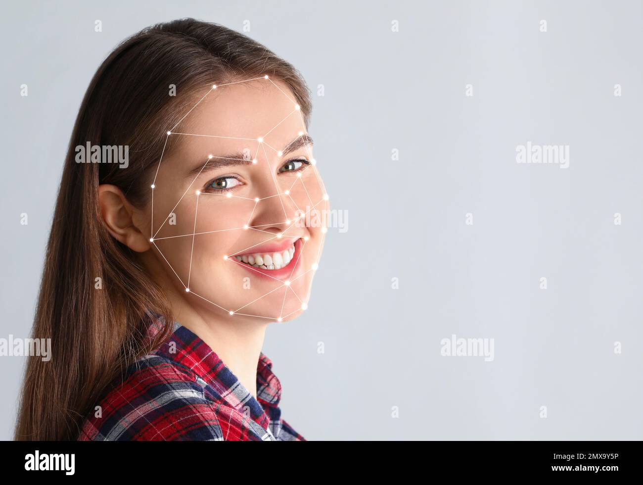Facial recognition system. Young woman with biometric identification ...