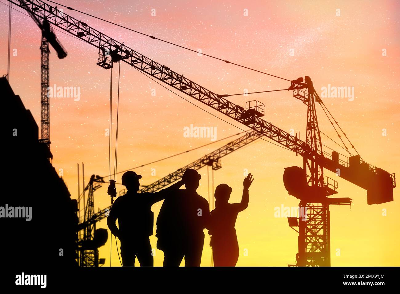 Silhouettes of engineers near construction site at sunrise Stock Photo ...