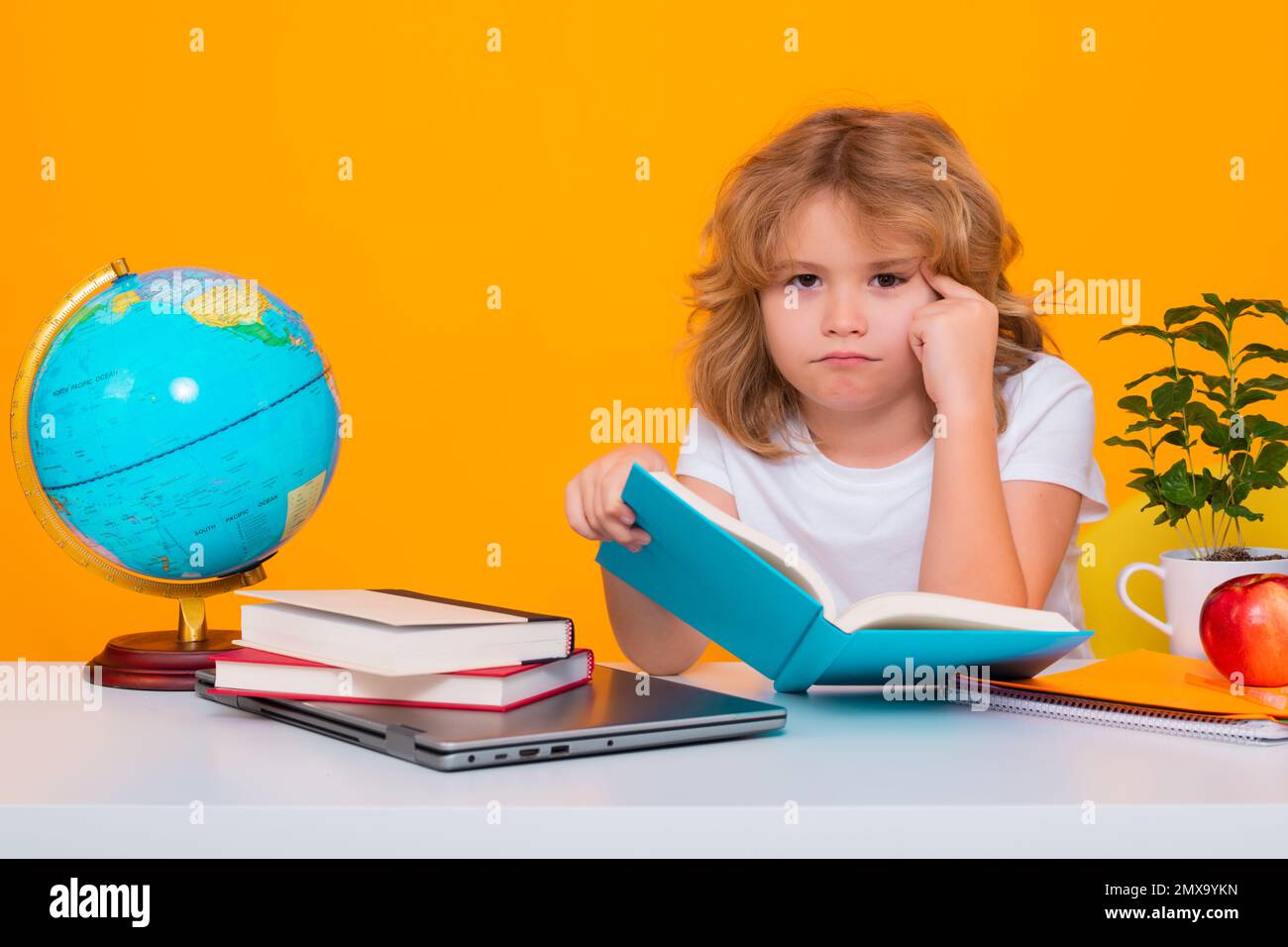 School child reading book. School and kids. Cute blonde child with a ...