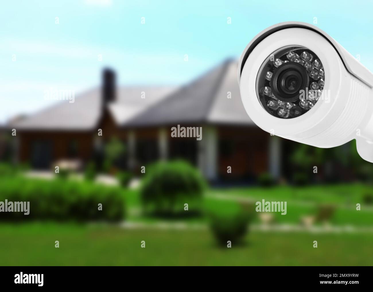 Home security system. House under CCTV camera surveillance Stock Photo ...