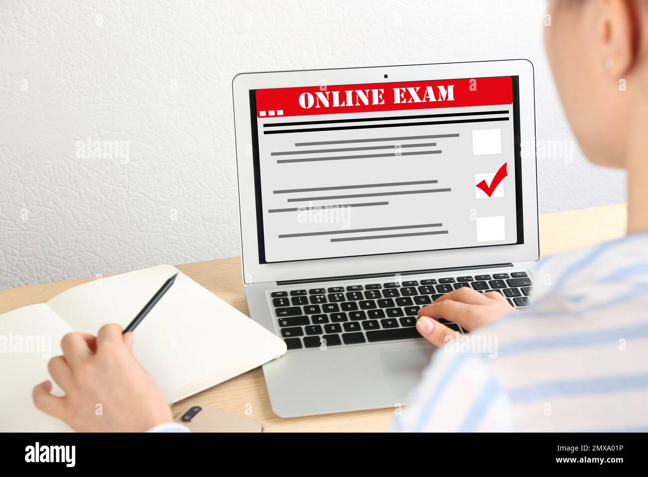 Student passing online exam at home, closeup Stock Photo - Alamy