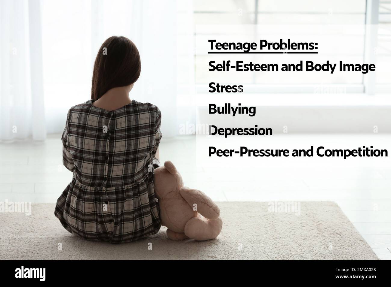 Sad girl sitting near window and suffering from teenage problems Stock ...