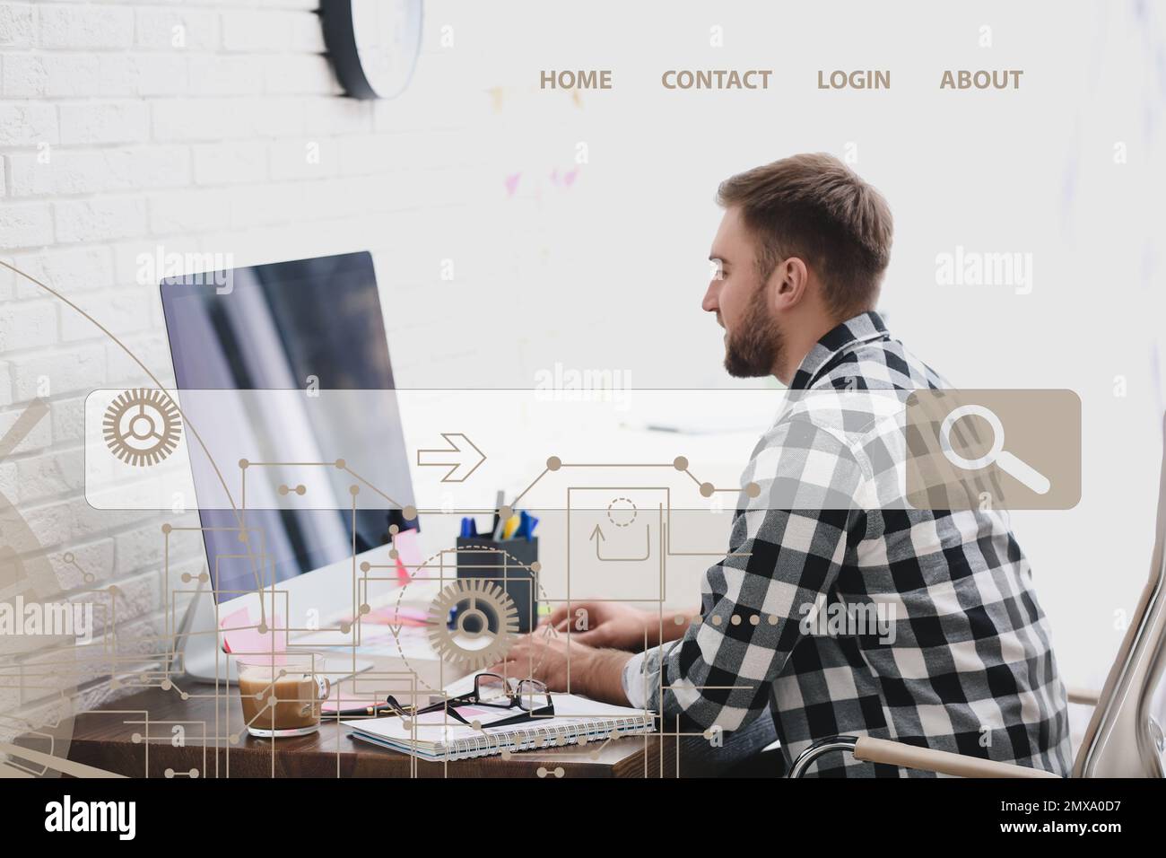 Search bar of internet browser and male designer working at desk in ...