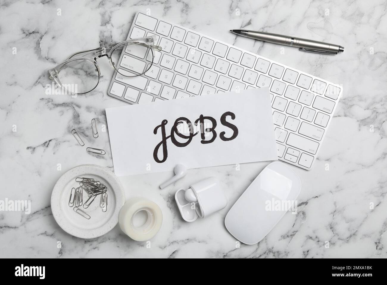 Flat lay composition with word JOBS, computer keyboard and stationery ...