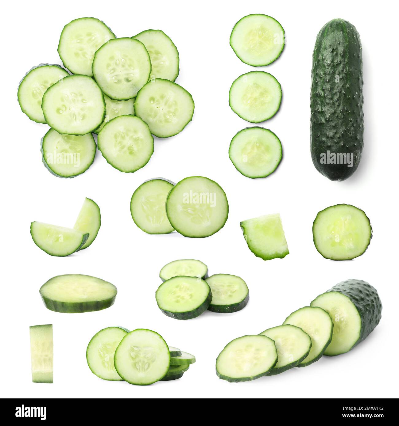 Set with fresh cucumber slices on white background Stock Photo - Alamy