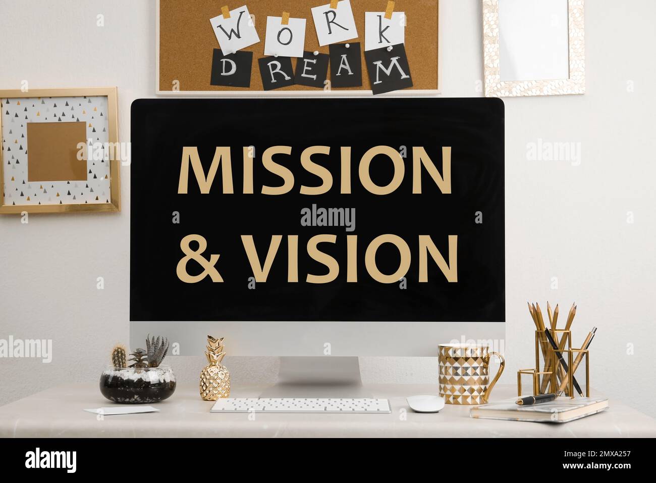 Modern computer with phrase MISSION AND VISION indoors Stock Photo - Alamy
