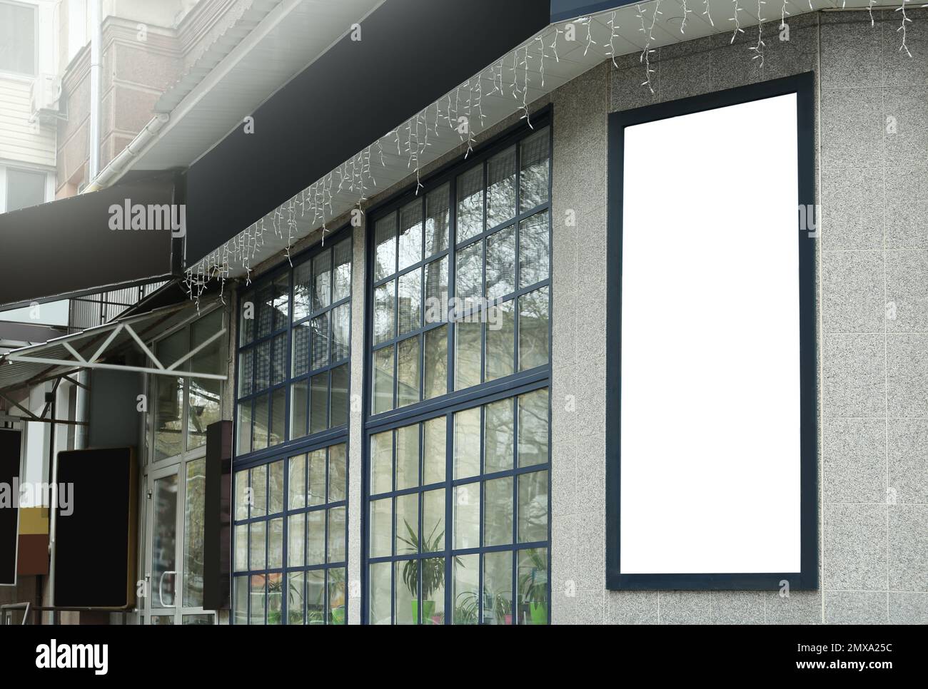 Blank banner on building facade outdoors. Advertising board design ...