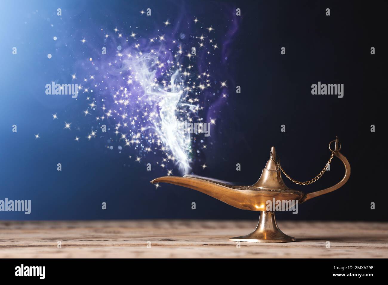 Genie appearing from magic lamp of wishes. Fairy tale Stock Photo - Alamy
