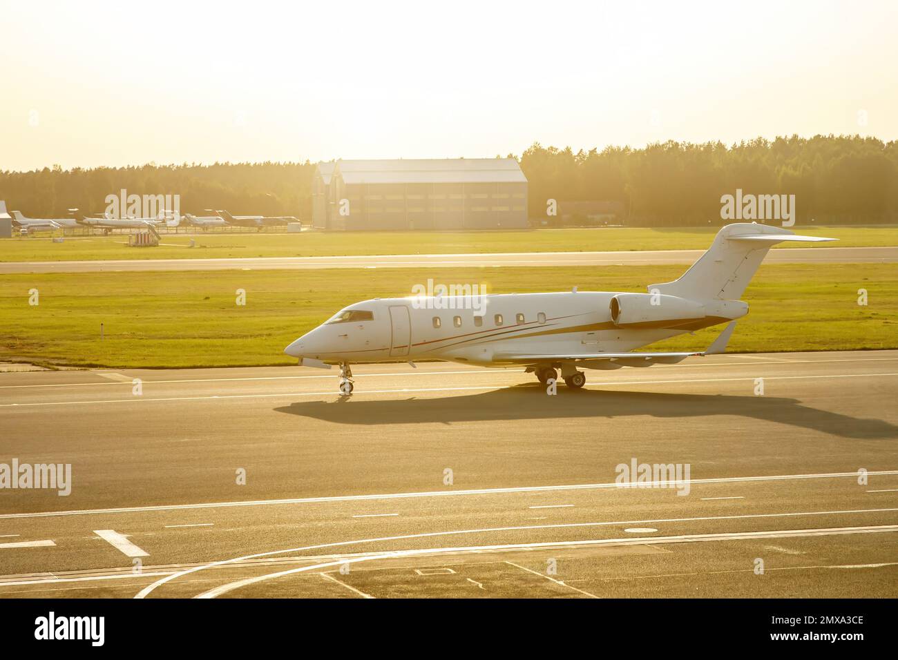 A small luxury private business jet on the airport runway strip Stock ...