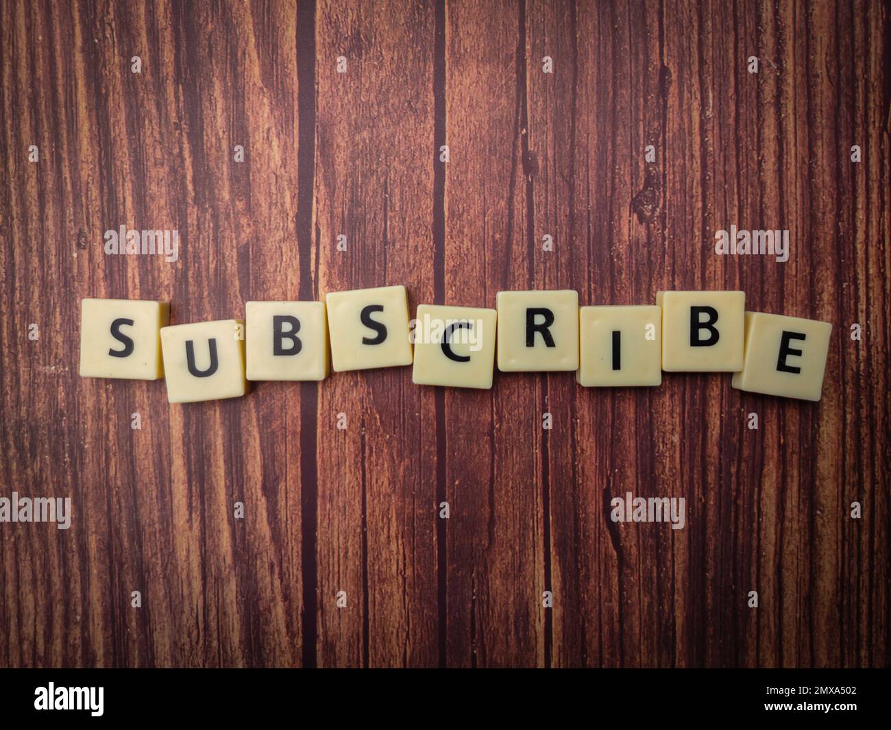 Toys word arranged on a wooden background with the arrangement of the ...