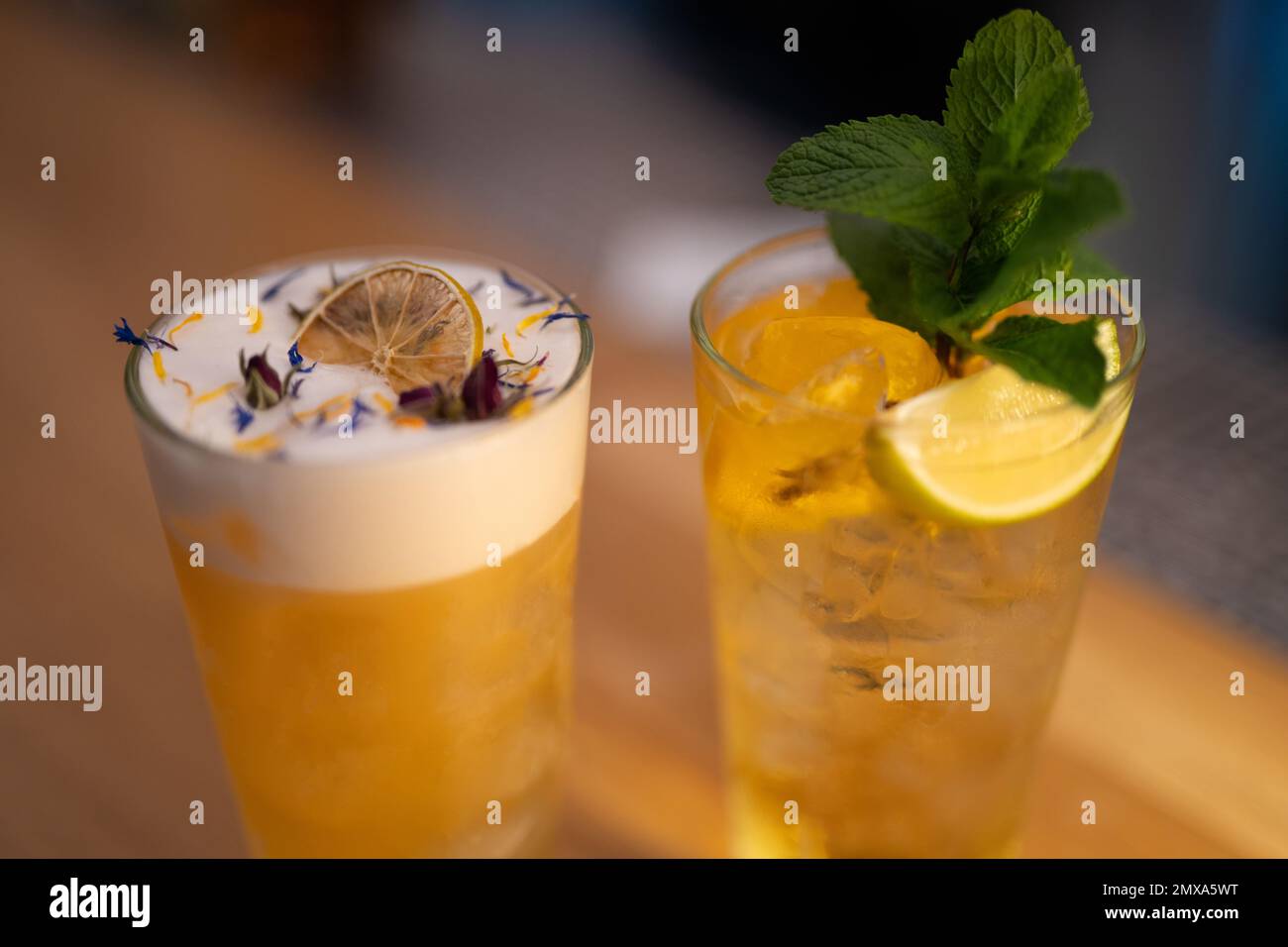 beautiful and delicious alcoholic cocktails prepared at the bar by the ...