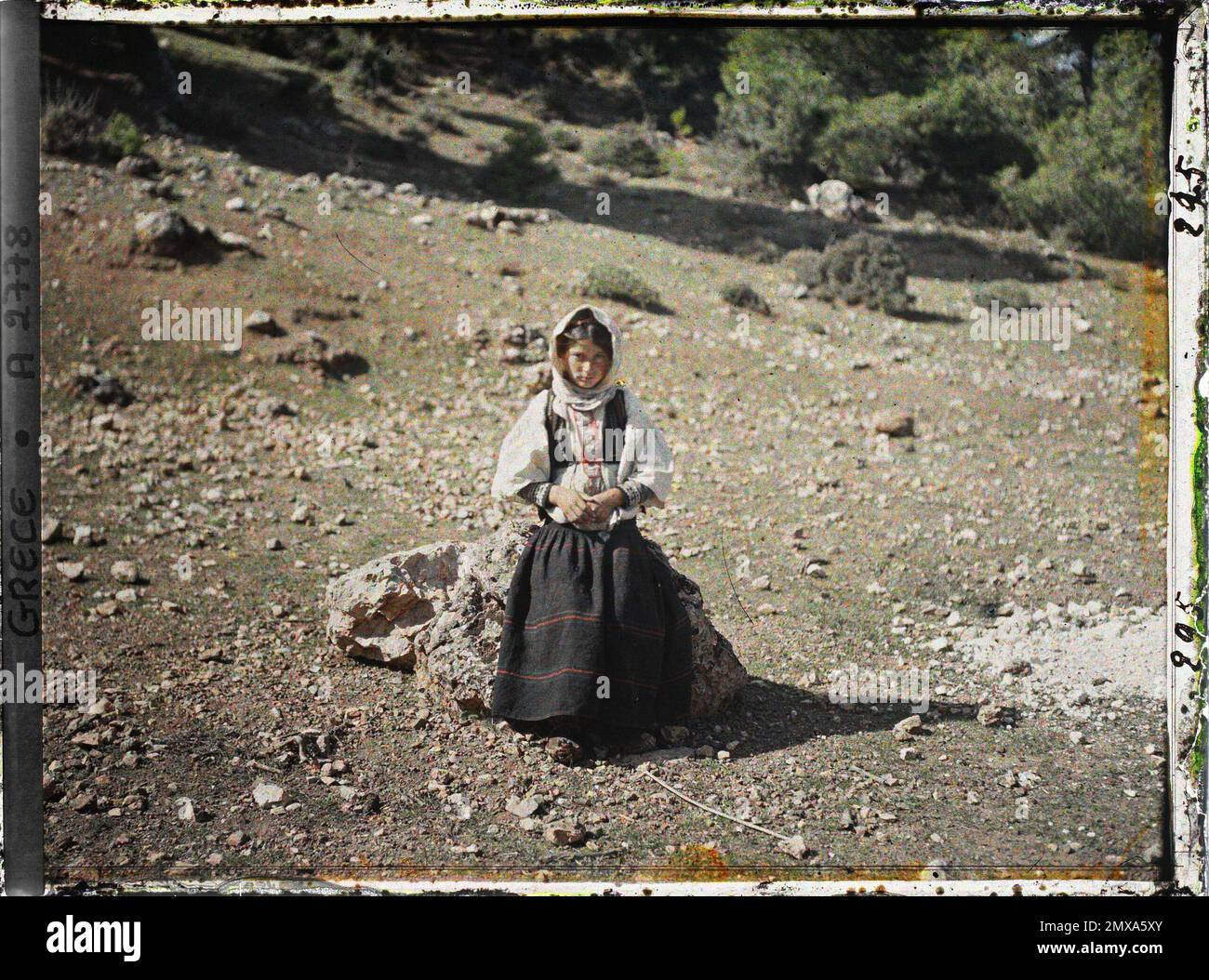 Domaine de Tatoï, Greece a small peasant (shepherdess) seated on a rock , 1913 - Balkans, Italy ...