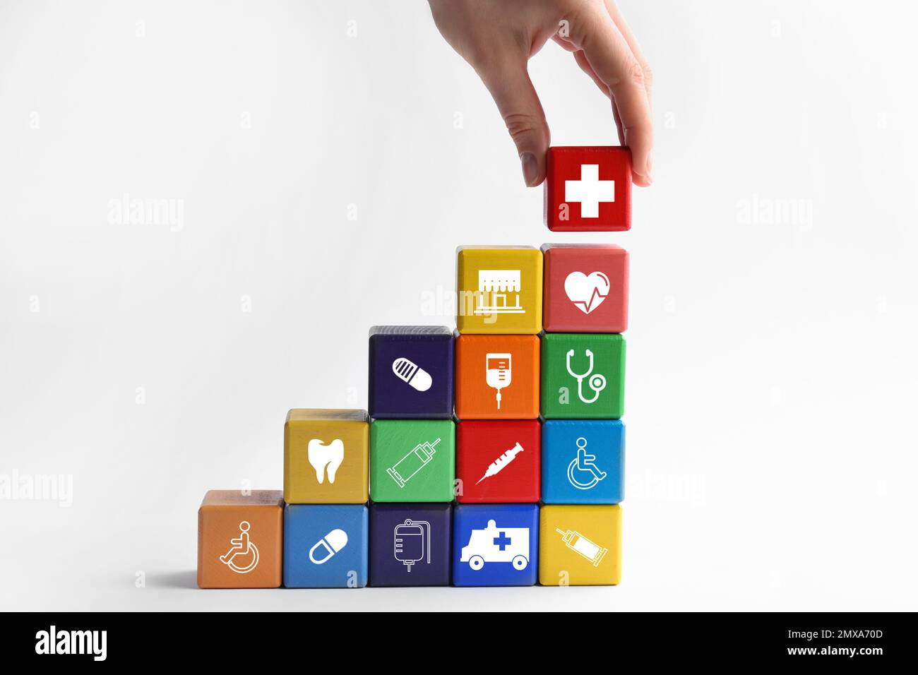 Woman building stairs with colorful cubes on white background. Health ...