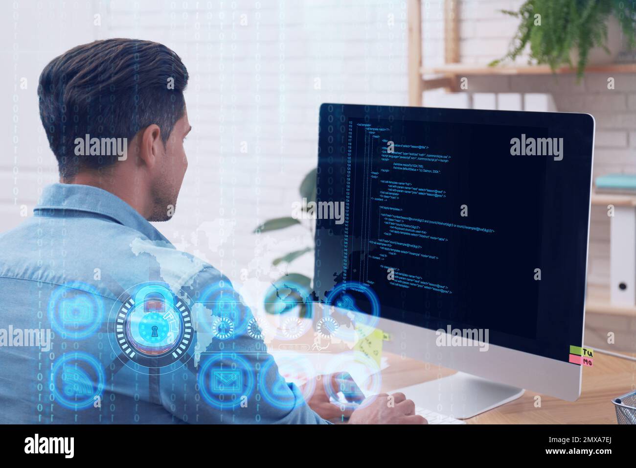 Professional programmer working with computer in office Stock Photo - Alamy